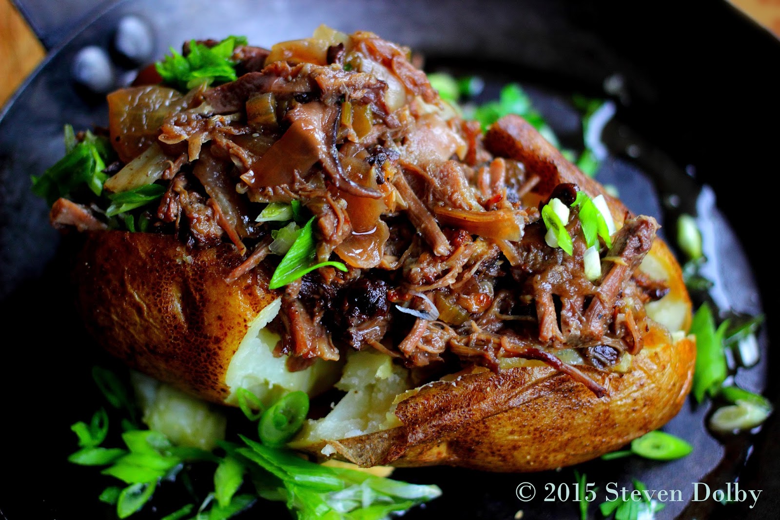 Braised short ribs stuffed baked potatoes by Steven Dolby