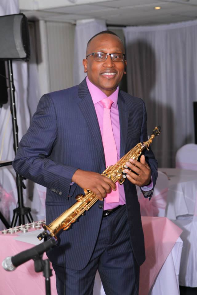 Collins Pratt 'De Champ' receives British Empire Medal for services to ...