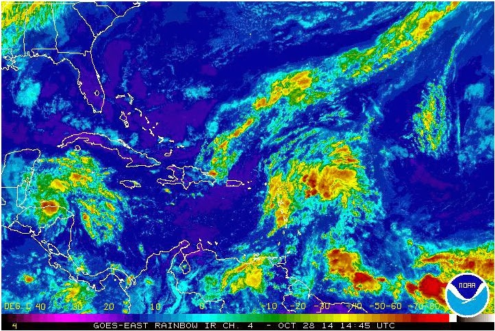 Roatan Weather: Mostly Cloudy, Light Winds, Intermittent Heavy Rain