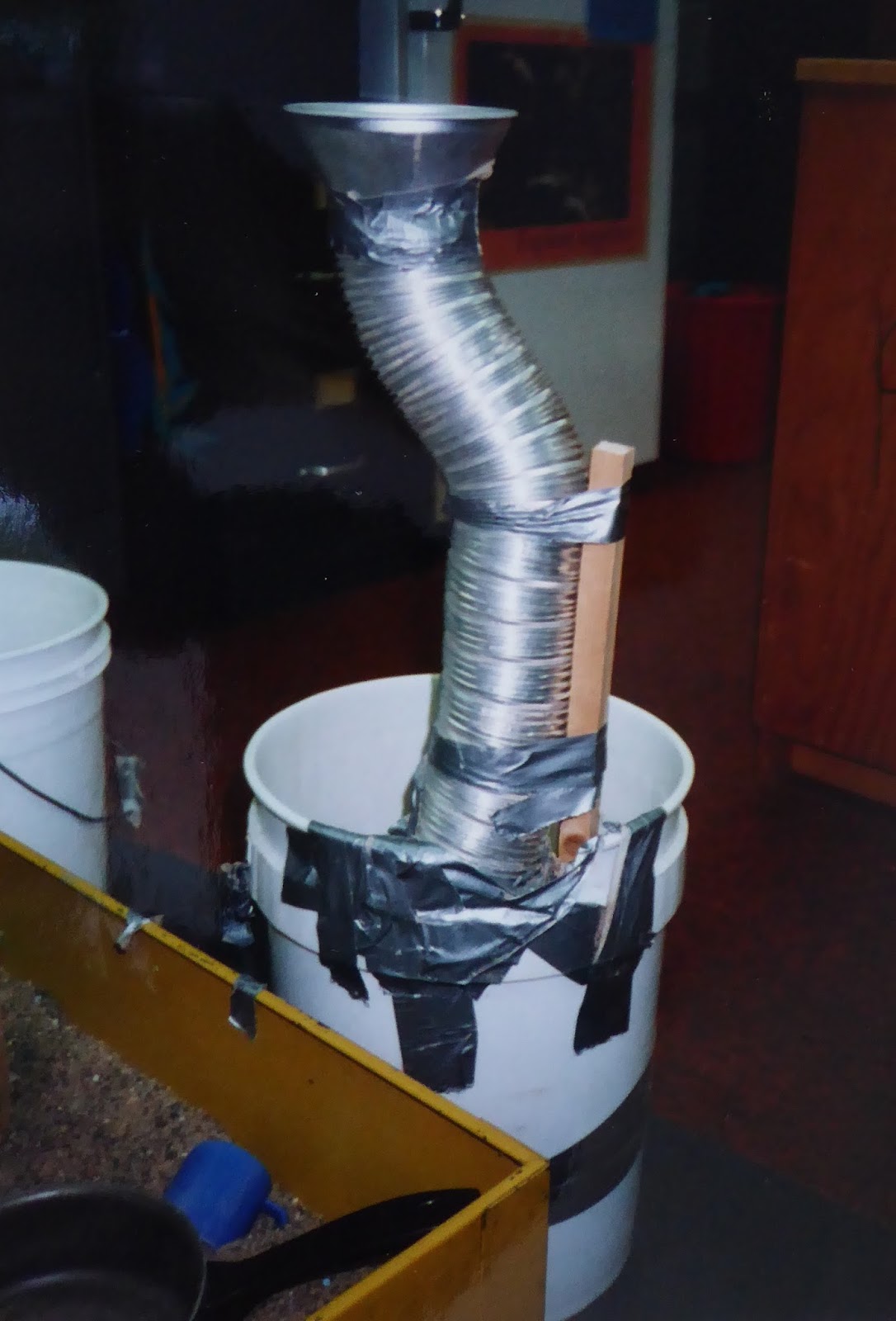 SAND AND WATER TABLES: Flex tube in a bucket