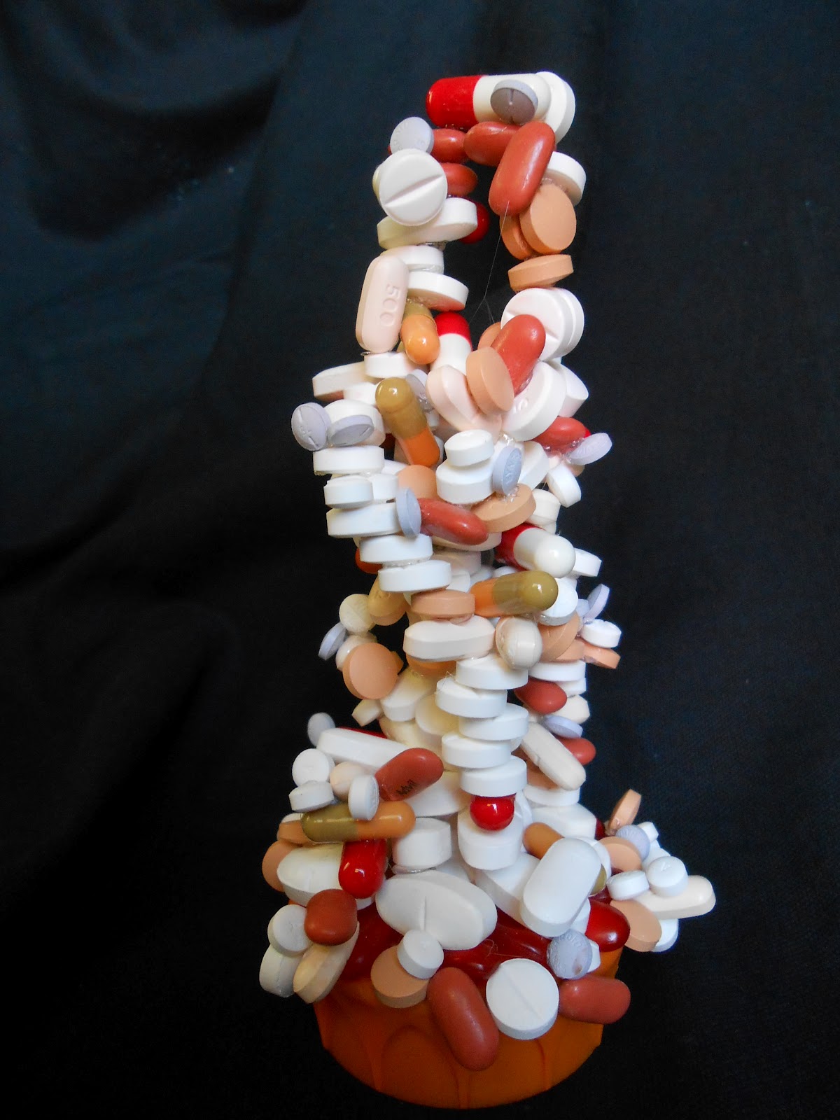 lonack signature: Pill Sculpture - allow Creativity to flow