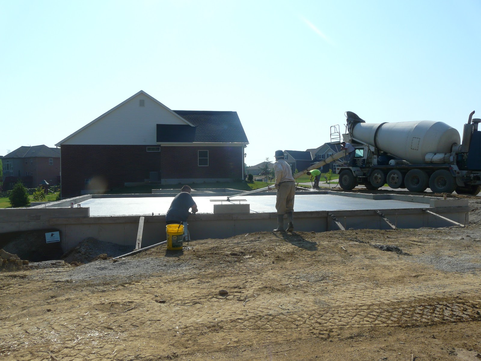 Jamie and Carrie's Home Building Adventures: Day 24 - Basement Slab Poured