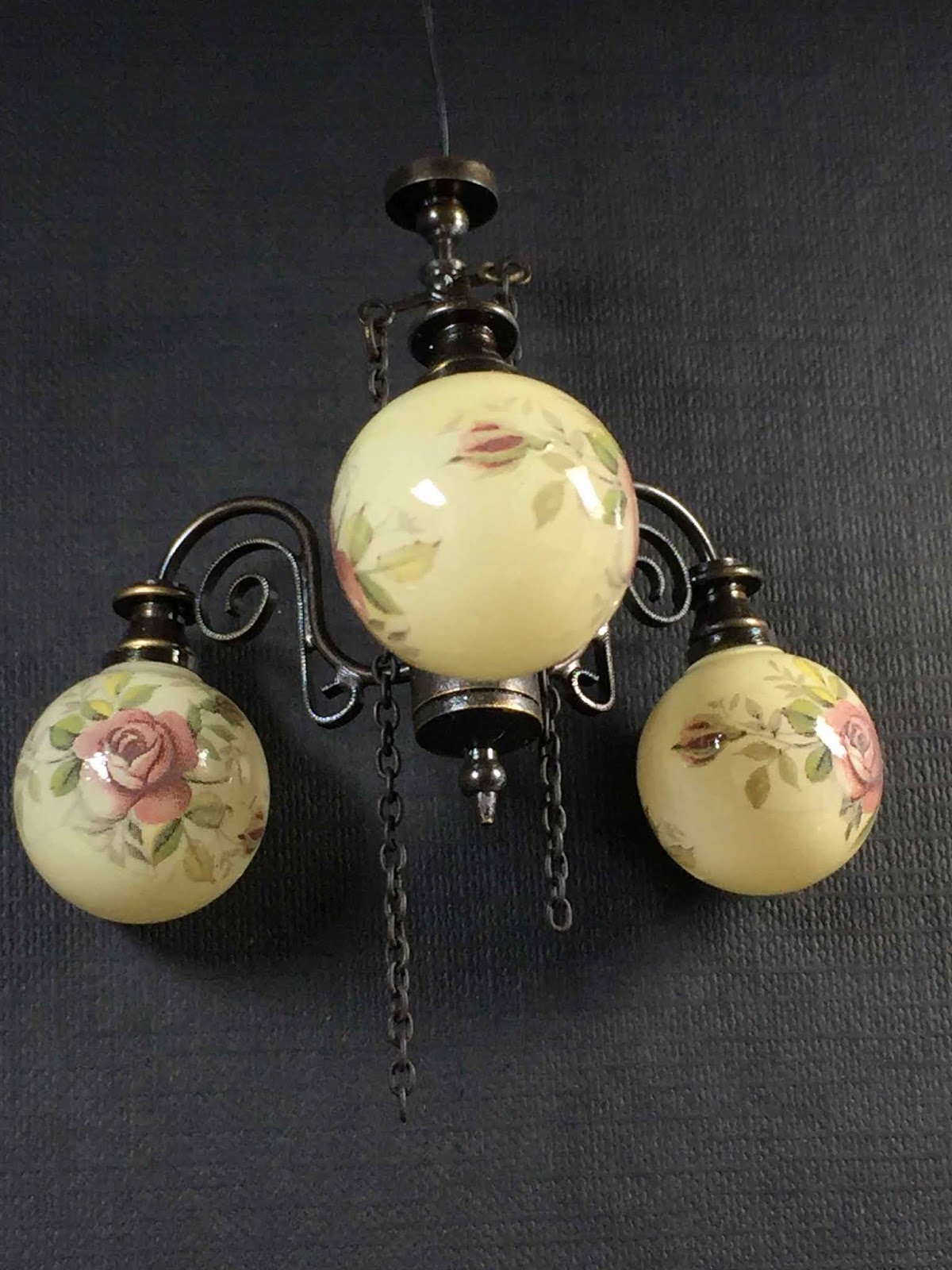 Ray Storey three arm pendant lights