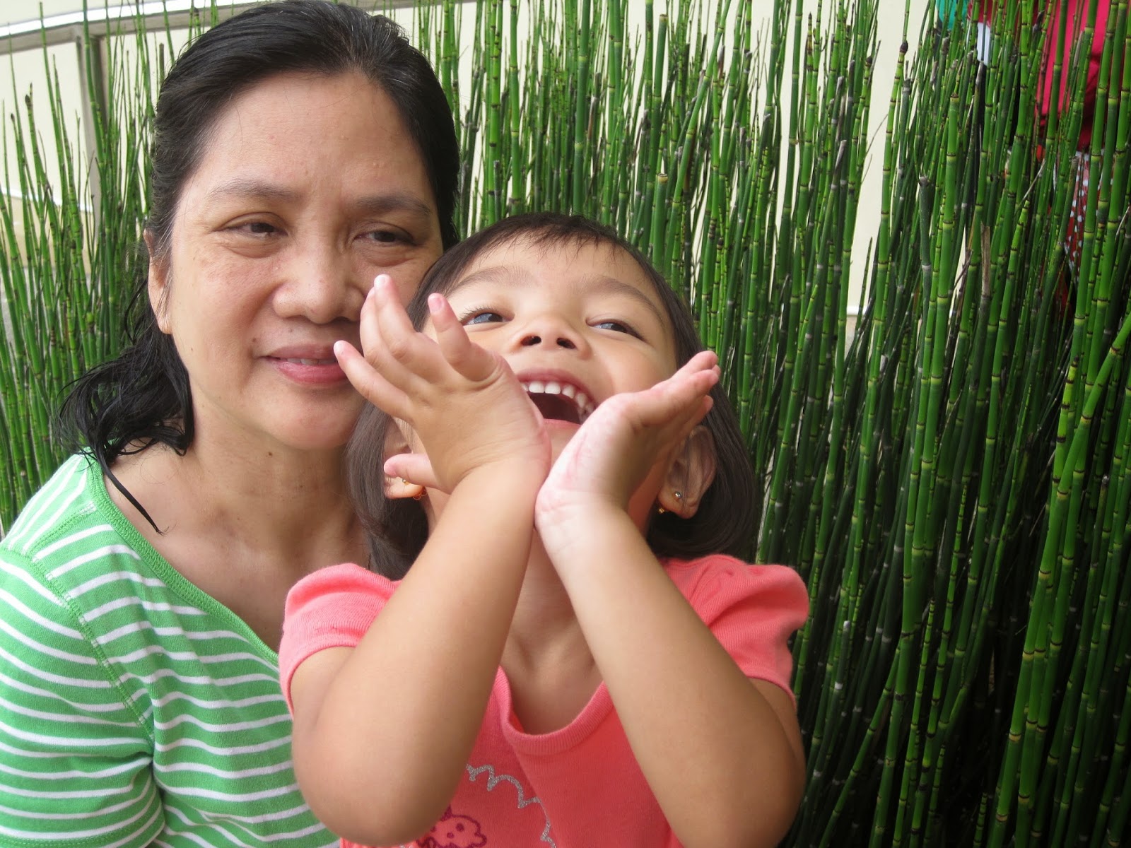 Brookside Baby: Hands cup cheeks