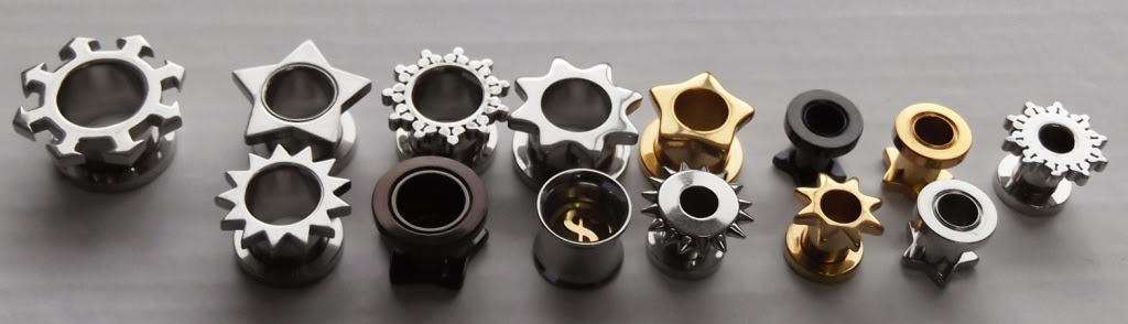 Tattoo Mundo : Piercing: expansores en acero y madera