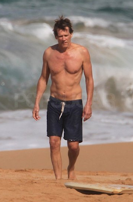 MEN'S JOURNAL AND GORGEOUS HUNK'S: Kevin Bacon Wearing The Dark Swim Trunks