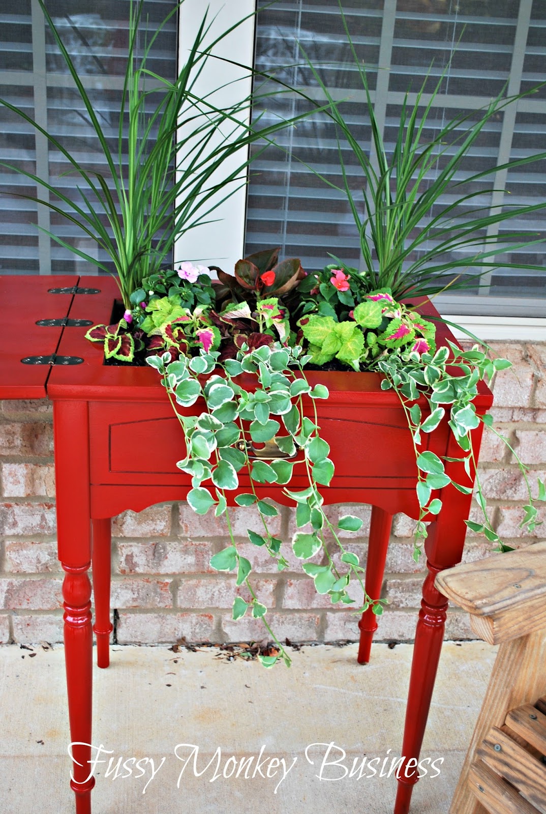Fussy Monkey Business: Old Sewing Machine Table turned Outdoor Planter