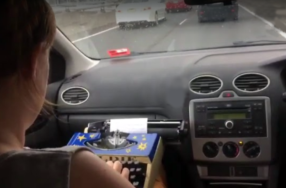 A car driven by a typewriter/ /THE TYPEWRITER REVOLUTION