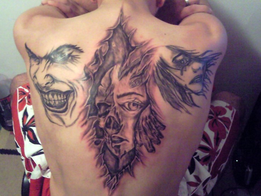 3D Evil Face Tattoos On Upperback