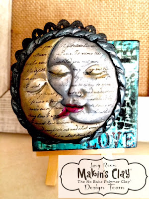 Faces of the Moon Mixed-Media Display by Lucy Reese