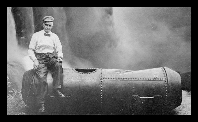 Bobby Leach and his barrel after his trip over Niagara Falls, 1911