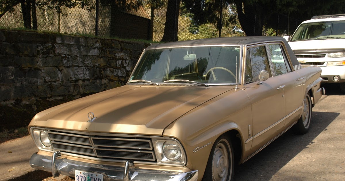 OLD PARKED CARS.: 1966 Studebaker Cruiser.