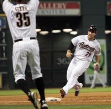 3rd base coach: Send the runner?