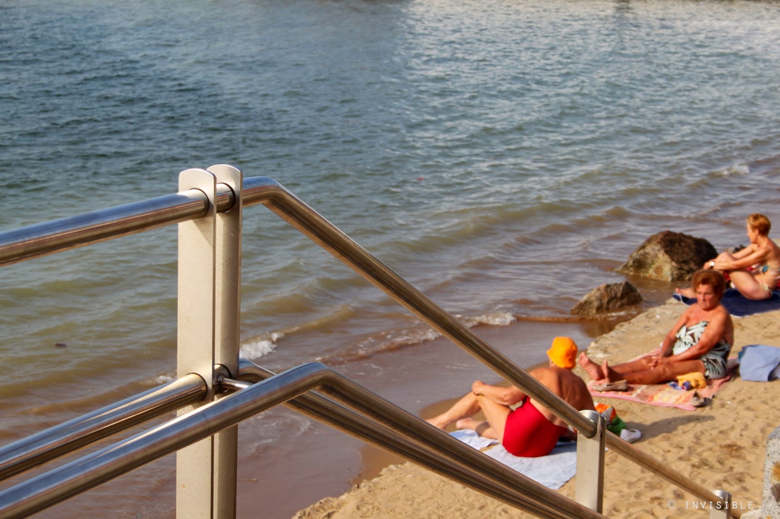 Invisible SLG Photos: Relax en la playa