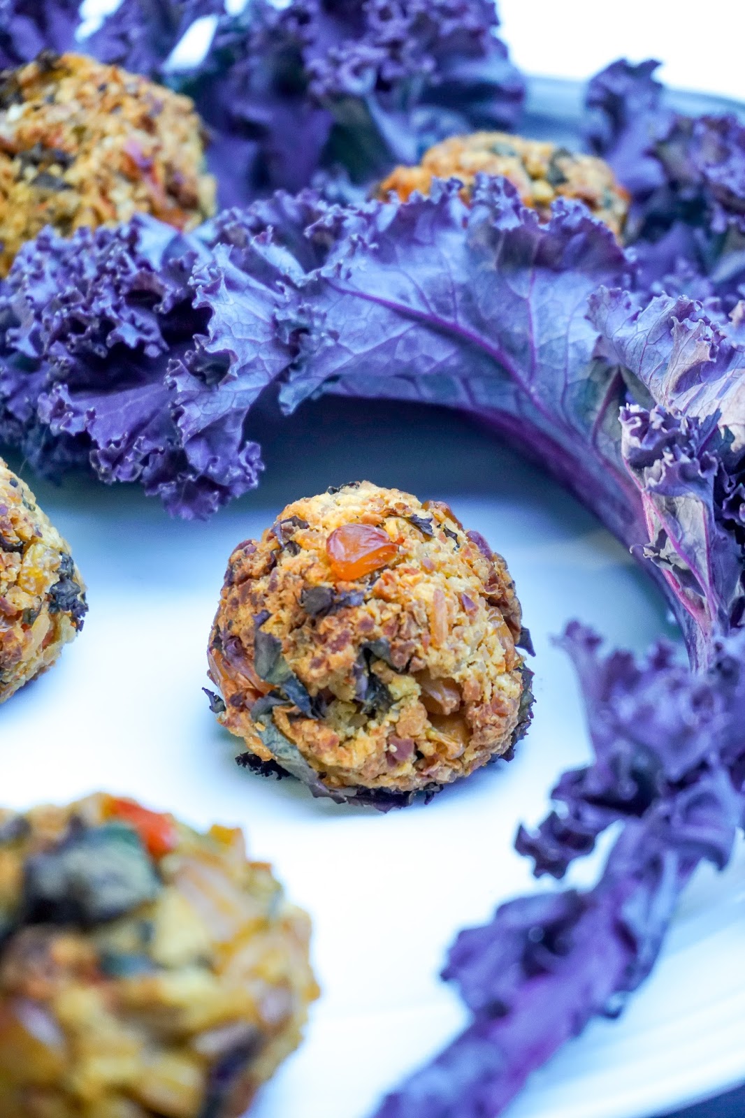 Chickpea veggie balls with carrots, corn and kale