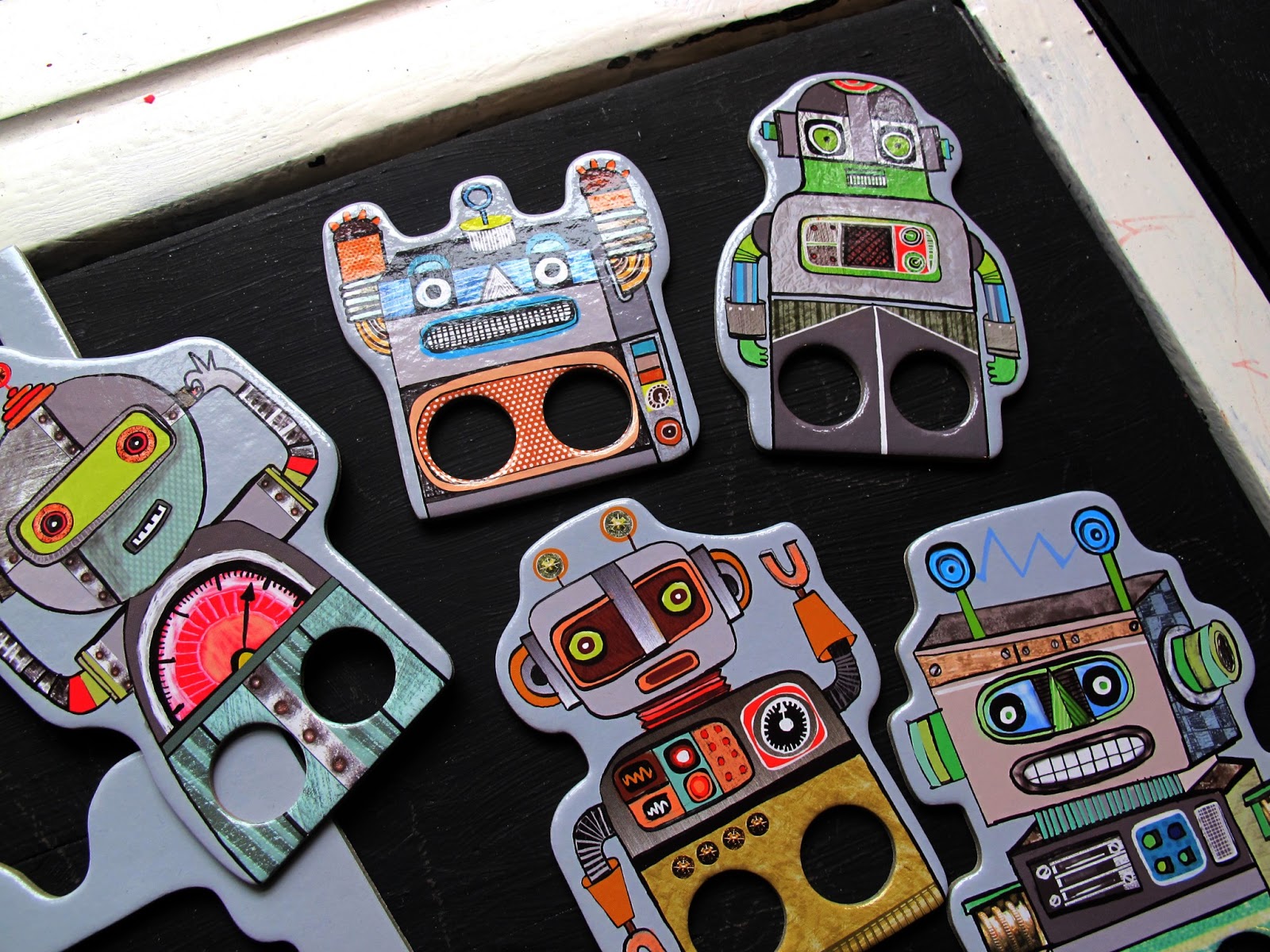 wonkybutton: mudpuppy finger puppet robots!