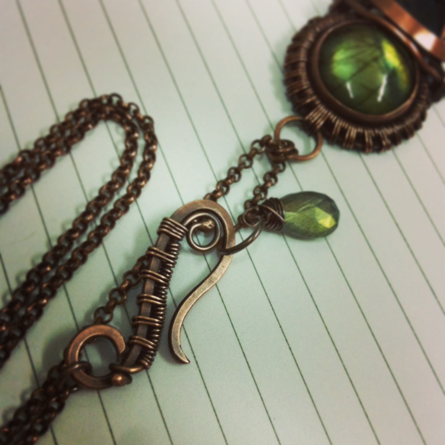 Handmade wire wrapped, filigree, fantasy and steampunk jewelry.