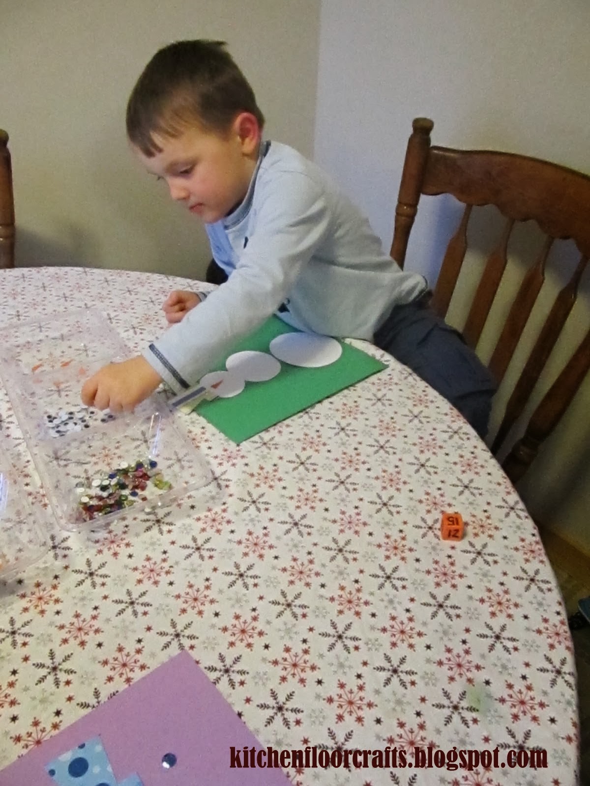 Kitchen Floor Crafts: Roll A Snowman Collage