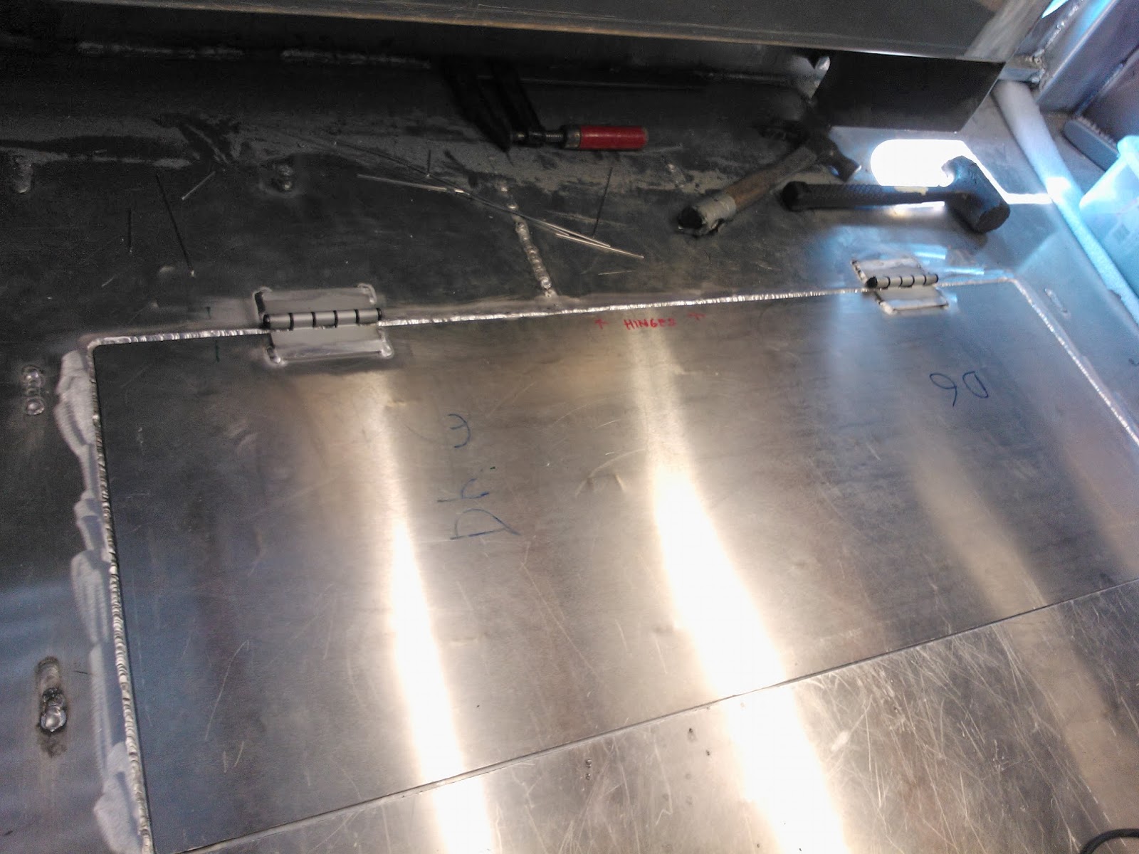 Hatches, bilge pump, fuel lines, bungs (Day 62 & 63)