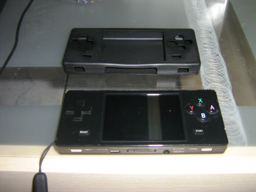 QG Master: Dingoo A320 - O Lendário Emulador Portátil