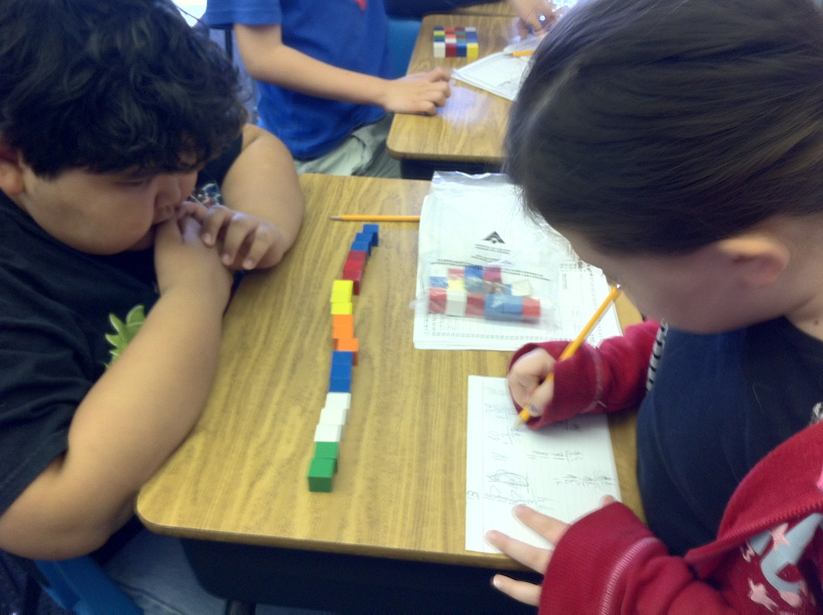 Mrs. Brooks's 3rd Grade: How Many Square Faces are exposed?