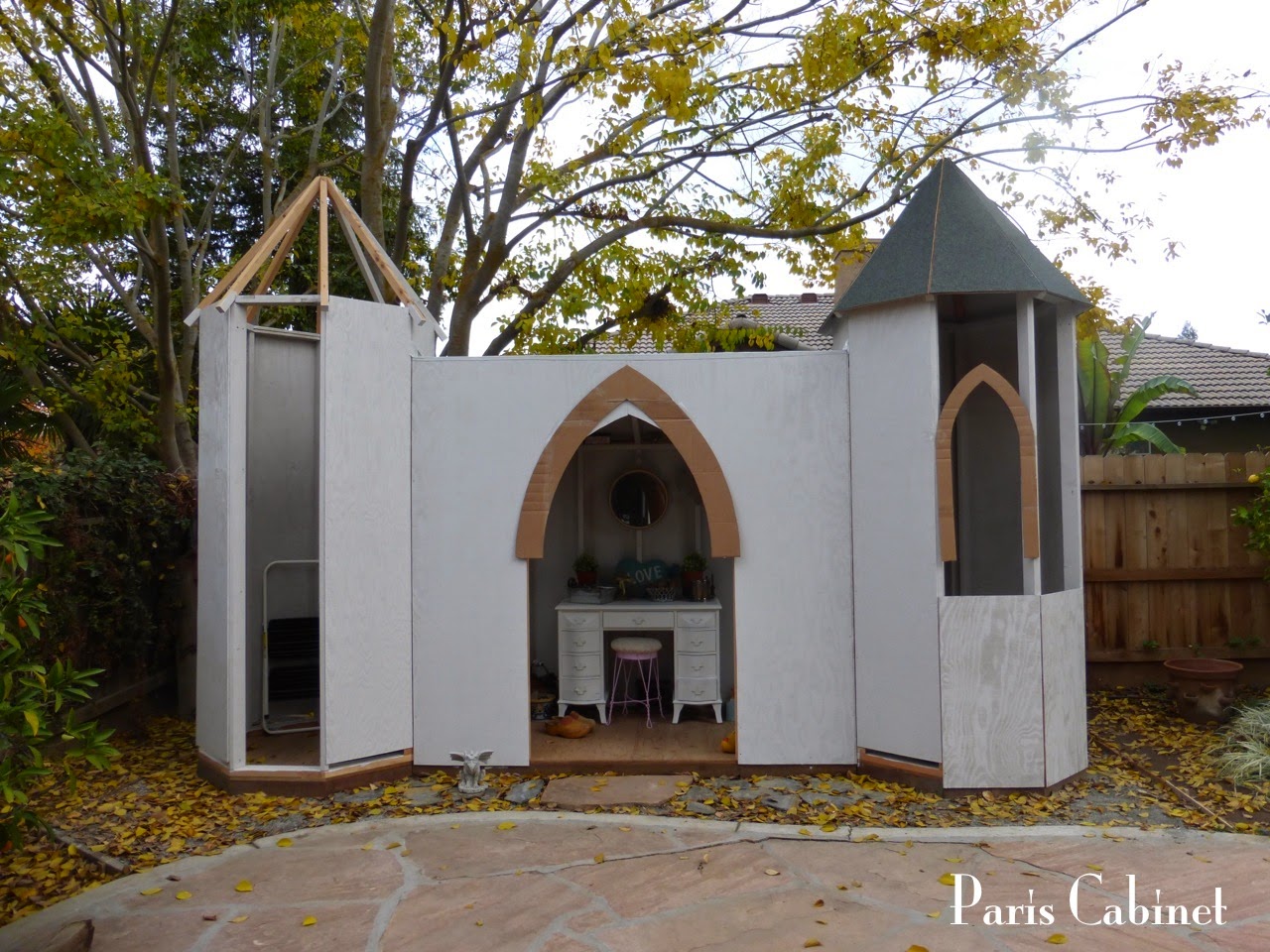 Paris Cabinet: Gothic Windows on Garden Castle Shed