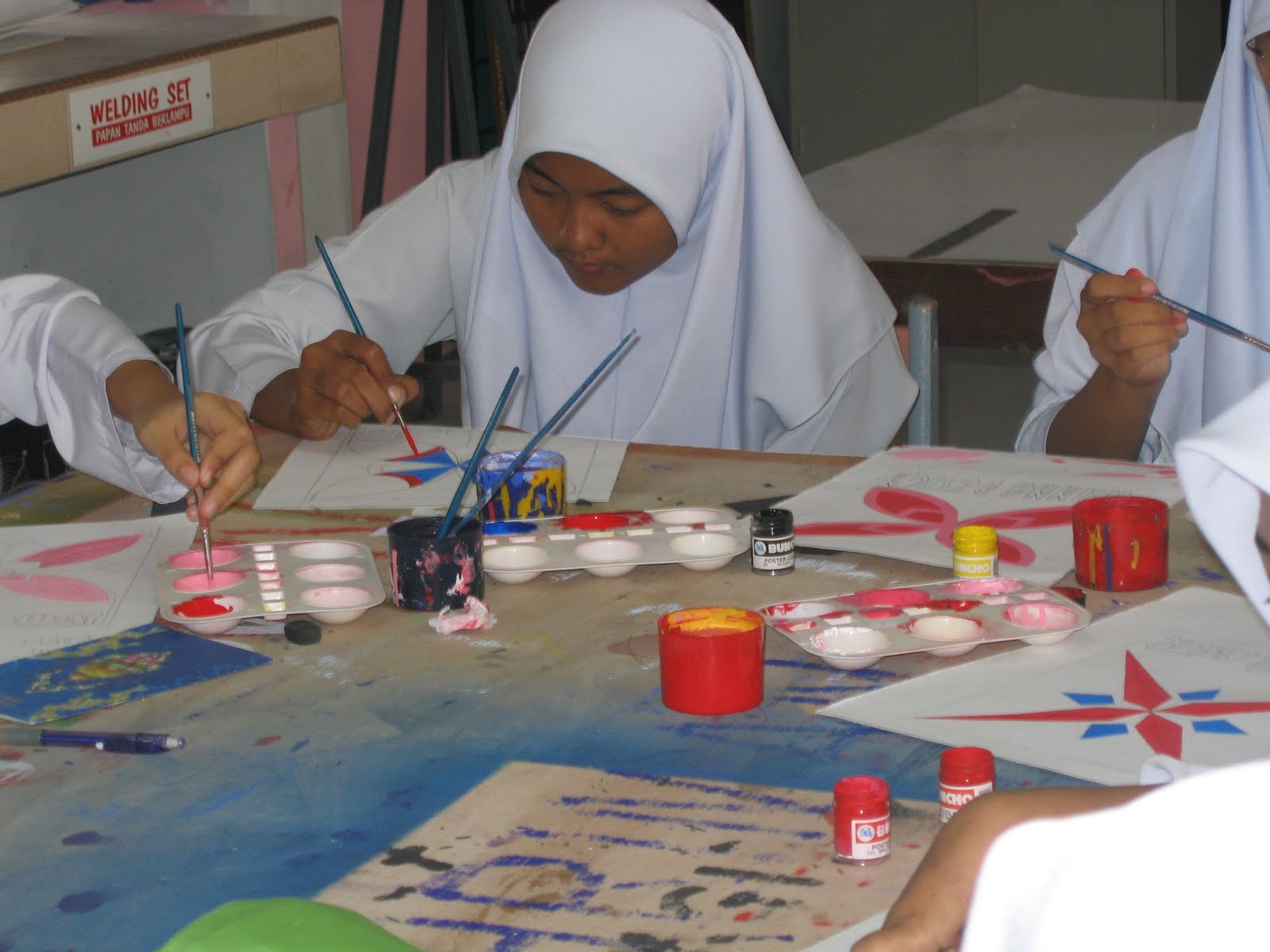 Seni Reka Tanda SMKSI: LOGO