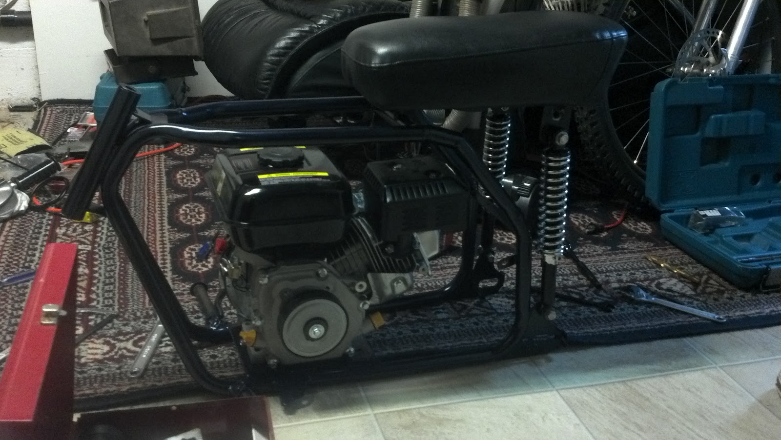 Robert's thoughts for today...: Rebuilding his Keystone mini bike.