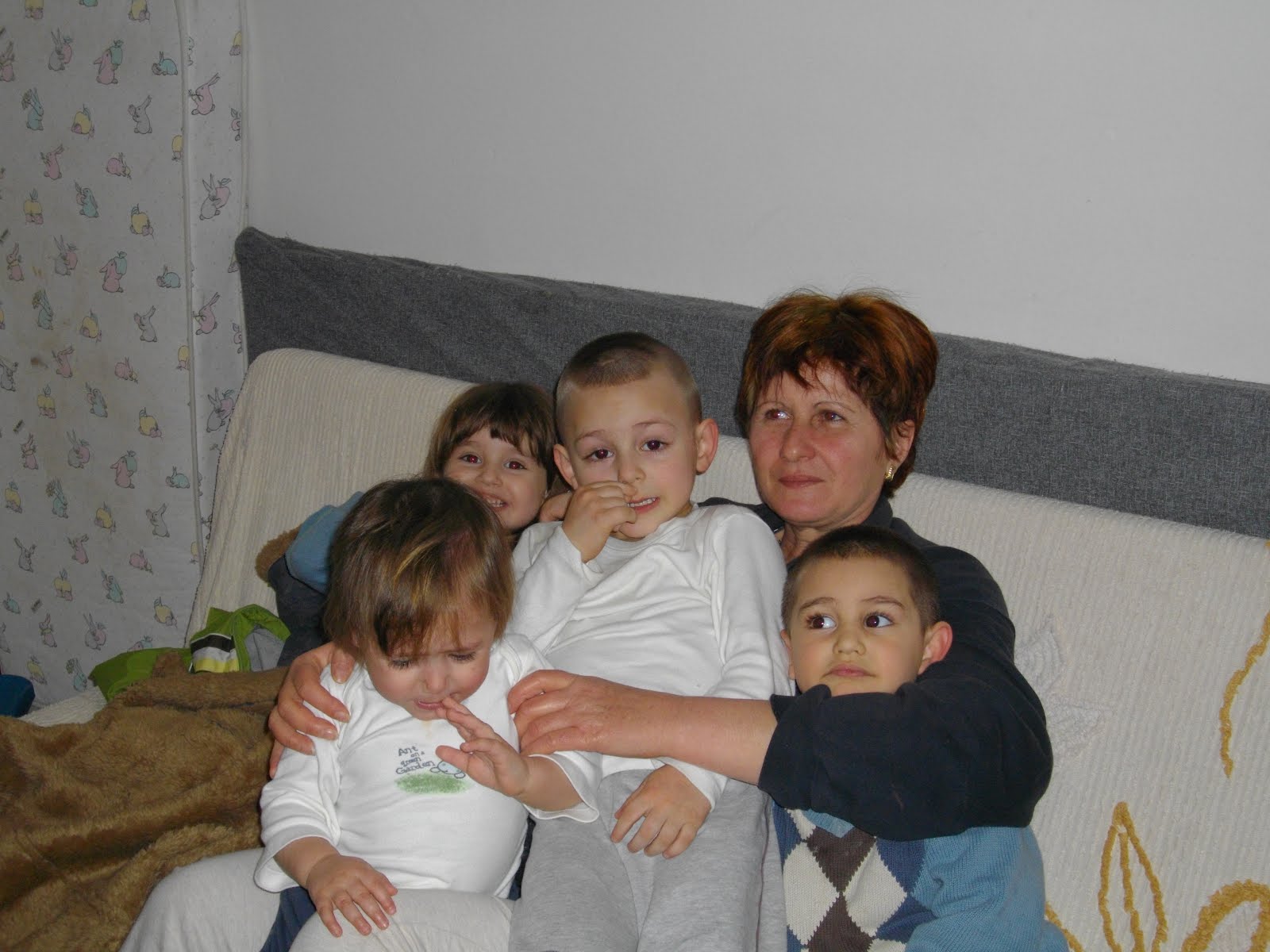 Giuliano Stroe: little Stroe brother with grandmother