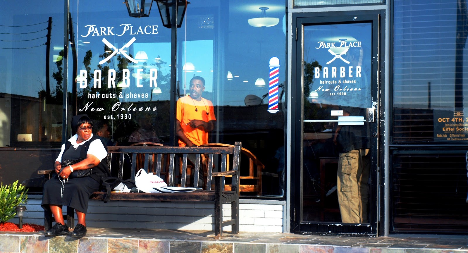 angels and people, life in New Orleans: barber shop storefront