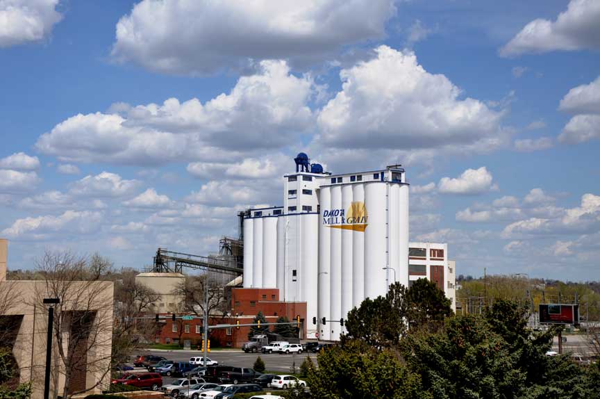 Taken For Granted: Grain Elevator and Ben Franklin Signs