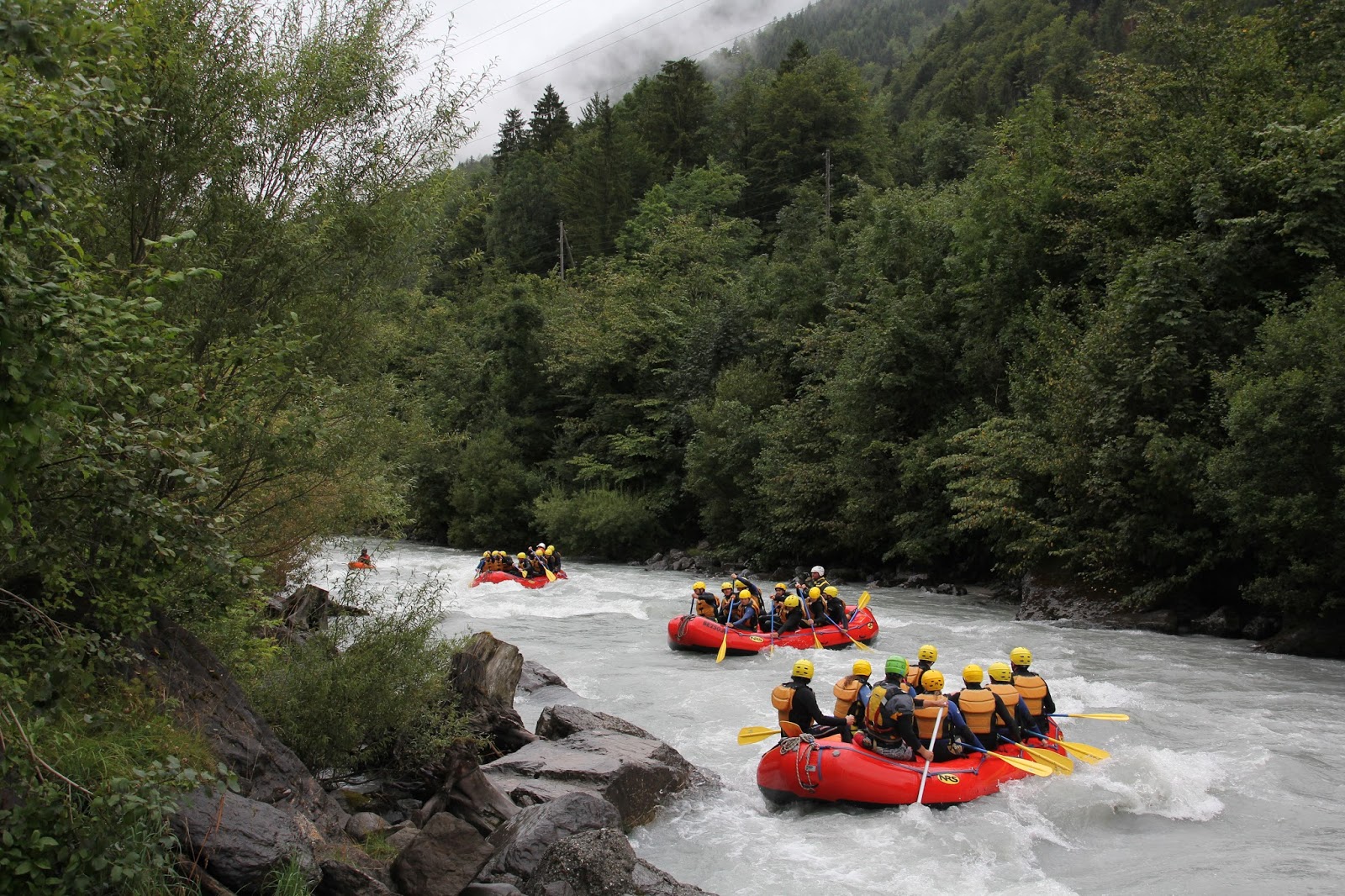 White Water Rafting In The Glacial River Of Interlaken, Switzerland