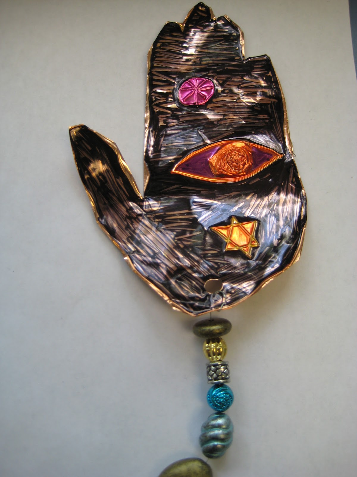 Edot: Origins of the Chamsa