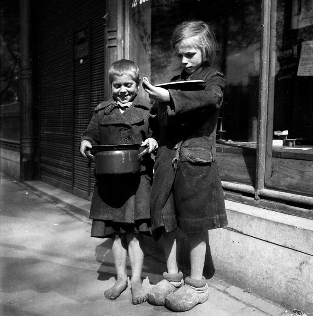 Dutch children are provided with bread and soup during the Hongerwinter ...