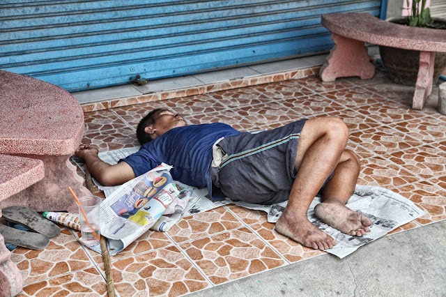 Thai Street Life: “Sprawled” Photograph