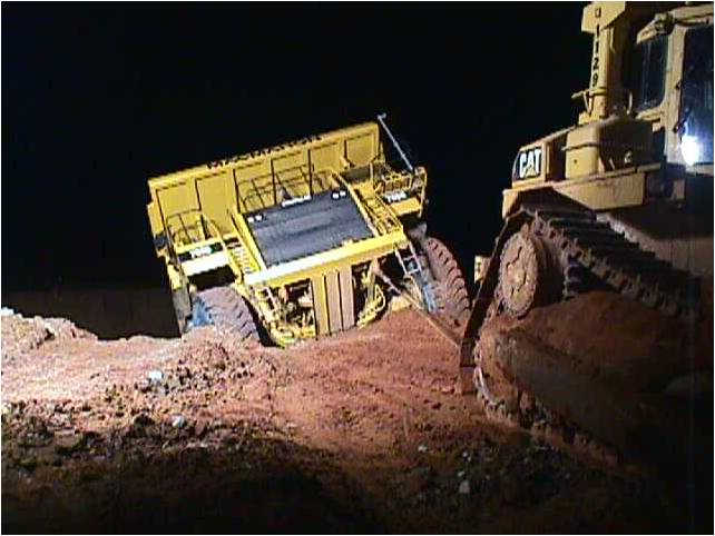 Mining Mayhem: Rear-Dumper Off Tip-Head