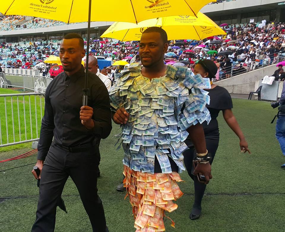 Herbalist wears money suit to South African gospel singer's funeral ...