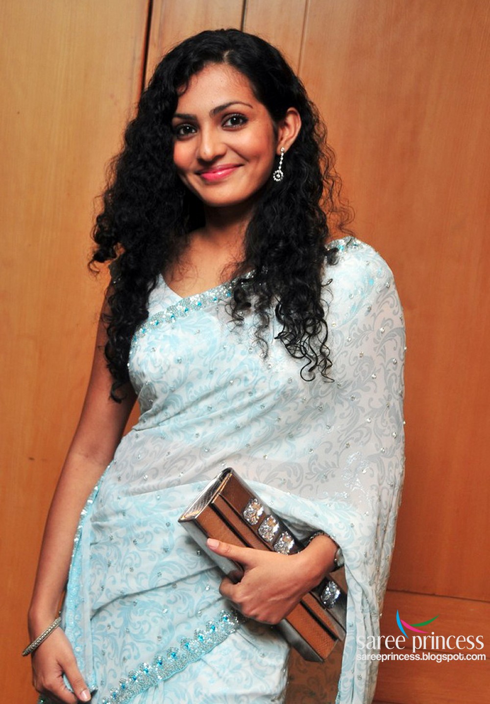 Malayalam film actress Parvathi Menon looking extremely cute in a white ...