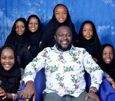 Photos of a Nigerian Muslim father with his six beautiful daughter