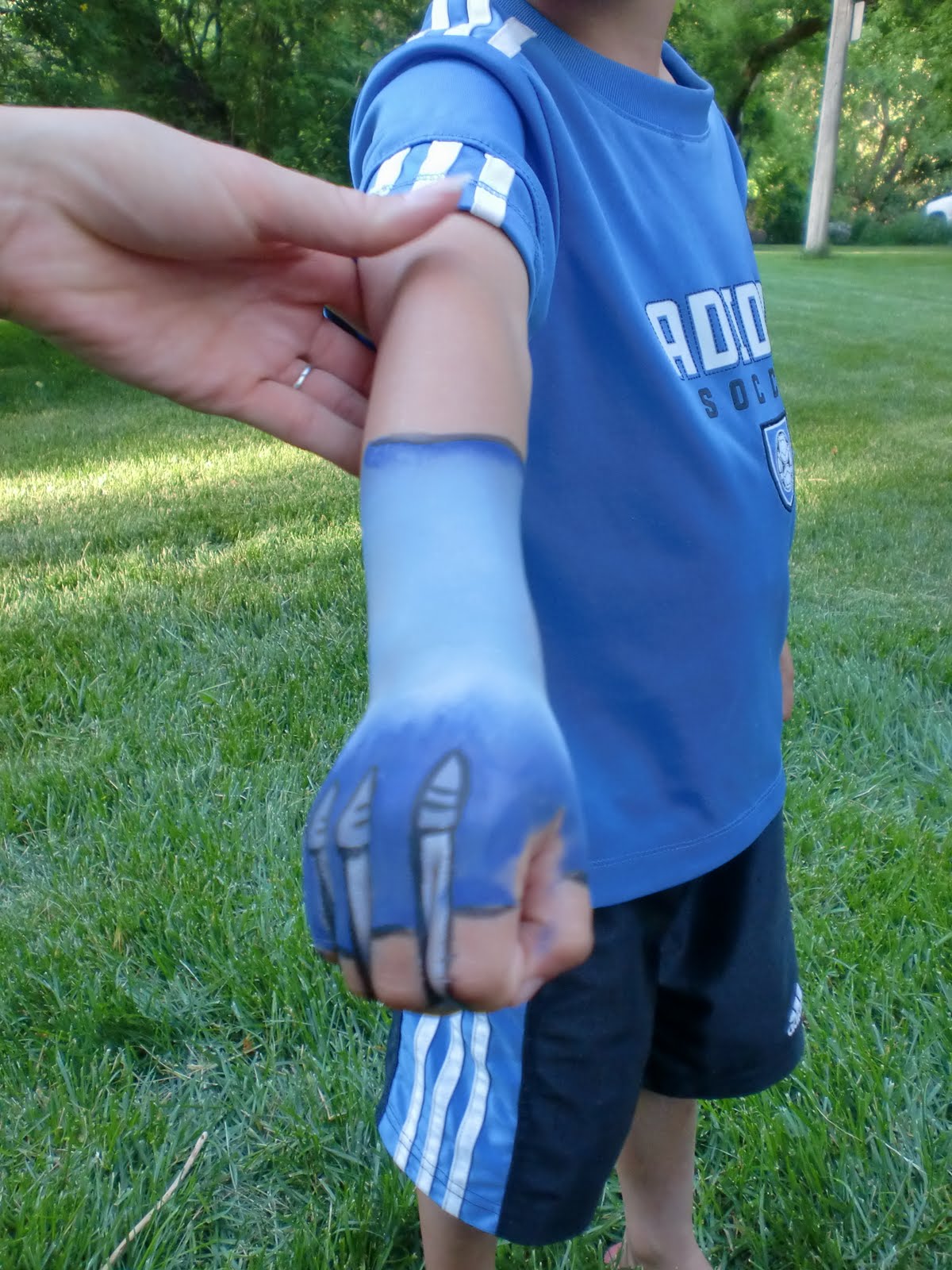 Face Painting Illusions and Balloon Art, LLC: Wolverine Claw Face Painting