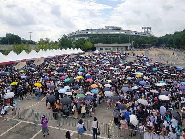 Fans spend all night outside stadium to purchase BTS concert merch