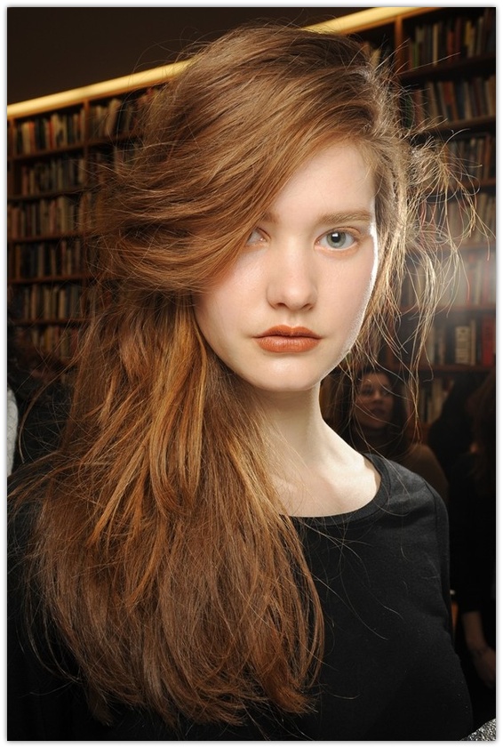 Deep side parted hair