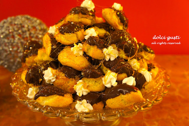 chocolate and cakes: profiteroles with chocolate, butter cream and ...