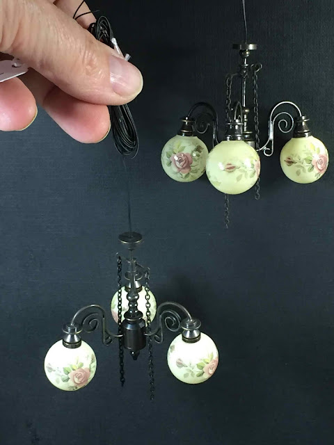 Ray Storey three arm pendant lights