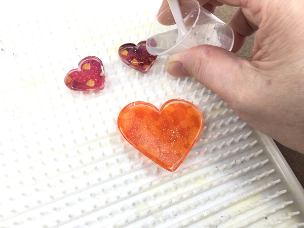 Layered Resin Jewelry Tutorial using Fabric and Heart Paper Punches ...