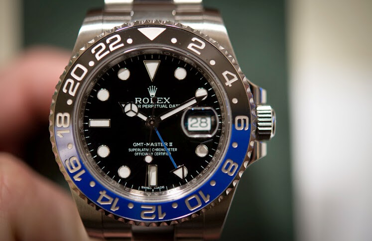 Swiss Design Watches: The Rolex GMT-Master II with Blue Black Batman Bezel