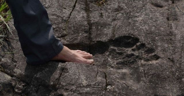 Footprint of a giant ancient human fossilized in rock found in China