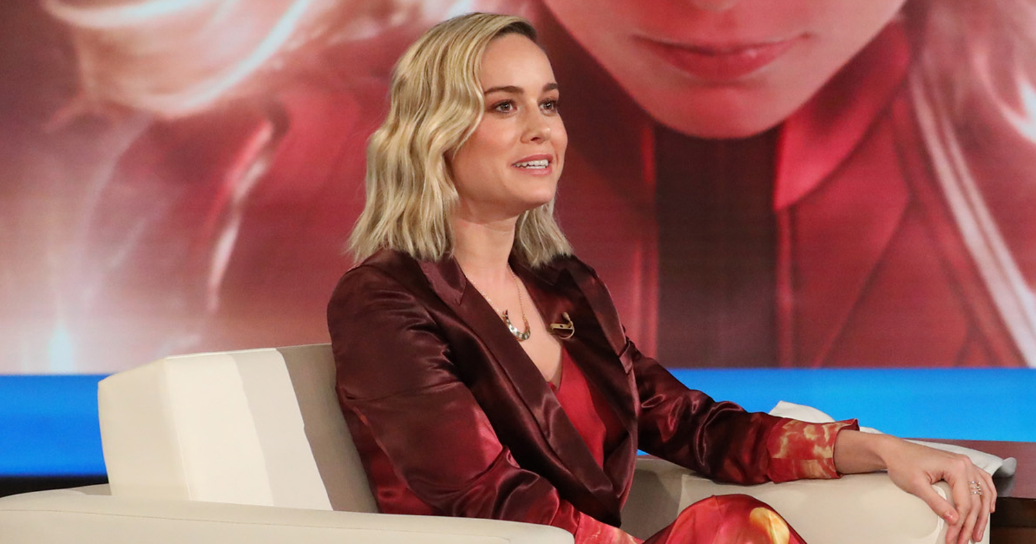 Ladies in Satin Blouses: Brie Larson - maroon satin suit