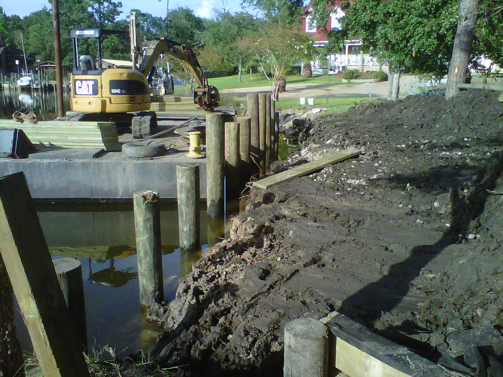 Porteaux Progress: First Slab section, and Waterfront Pilings