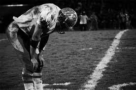 Exhausted Football Athlete